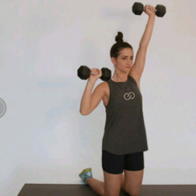 Kneeling Alternating Overhead Press - Exercise How-to - Workout Trainer ...