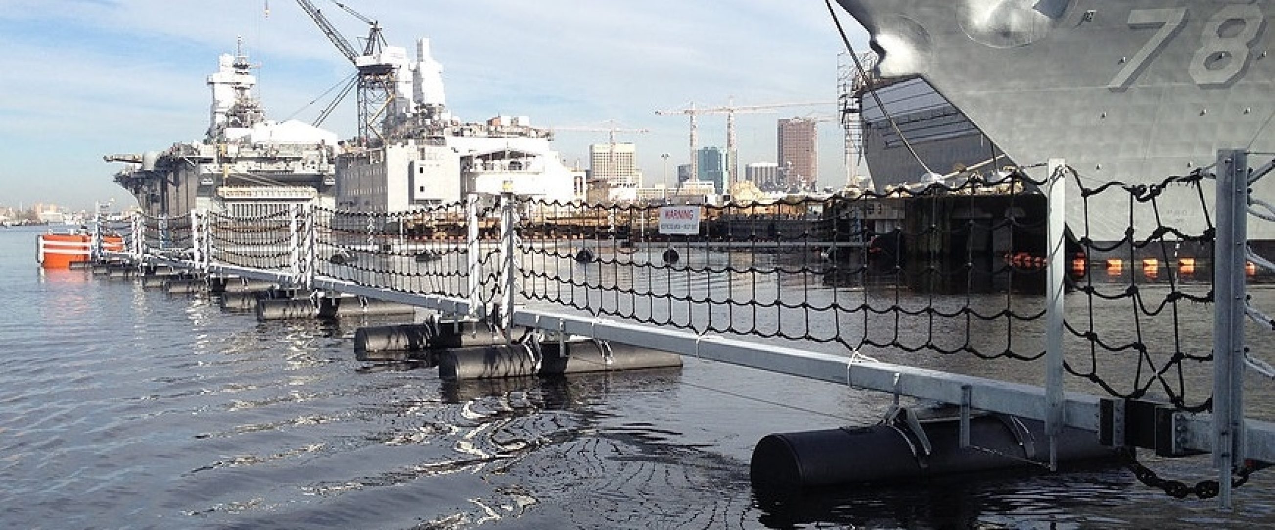 US Navy Port Security Barrier Buoys | American Galvanizers Association