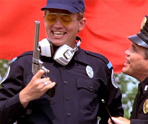 Tackleberry from Police Academy always had a big gun.