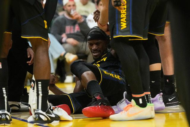 Warriors guard Jimmy Butler tears ACL in his right knee against Heat ...