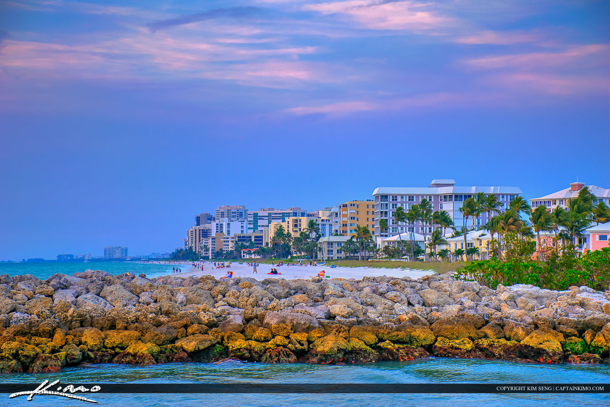 People at the Beach in Naples Florida with Condos | Royal Stock Photo