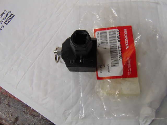 07AAA-TZ3A100 - Lock Release | Genuine Honda Parts
