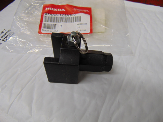 07AAA-TZ3A100 - Lock Release | Genuine Honda Parts