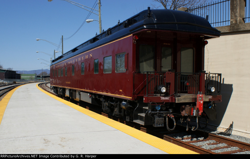 NS 32 sits alone on the platform at Lynchburg. rear end view.