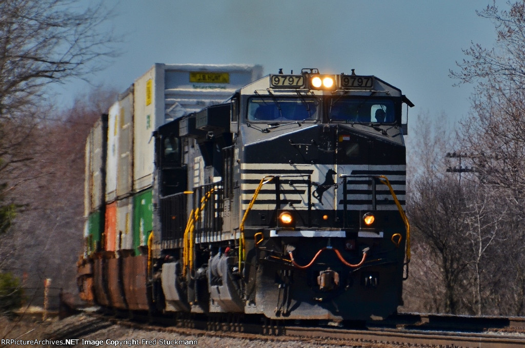 NS 9797 charges across SR303.