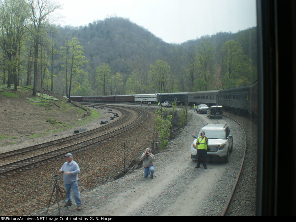 Excursion train stretched around the curve next to the N&W mainline at ...