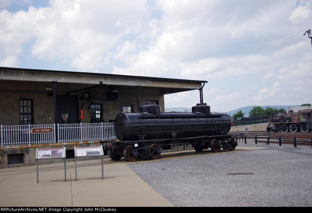 Tank car getting restored outside the oil house