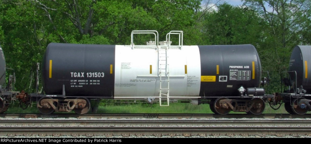 TGAX 131503 02-1985 built phosphoric acid tank car at the north end of ...