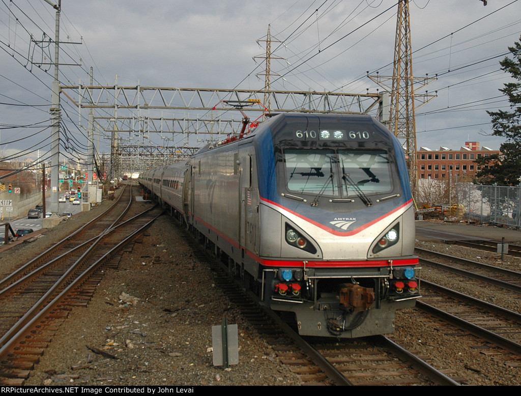 Southbound Amtrak NE Regional being led by a Sprinter