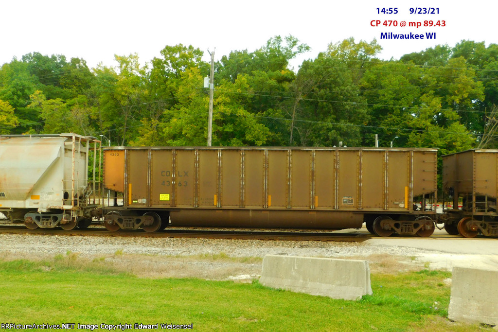 A pair of COLX coal hoppersneeded attention @ Portage