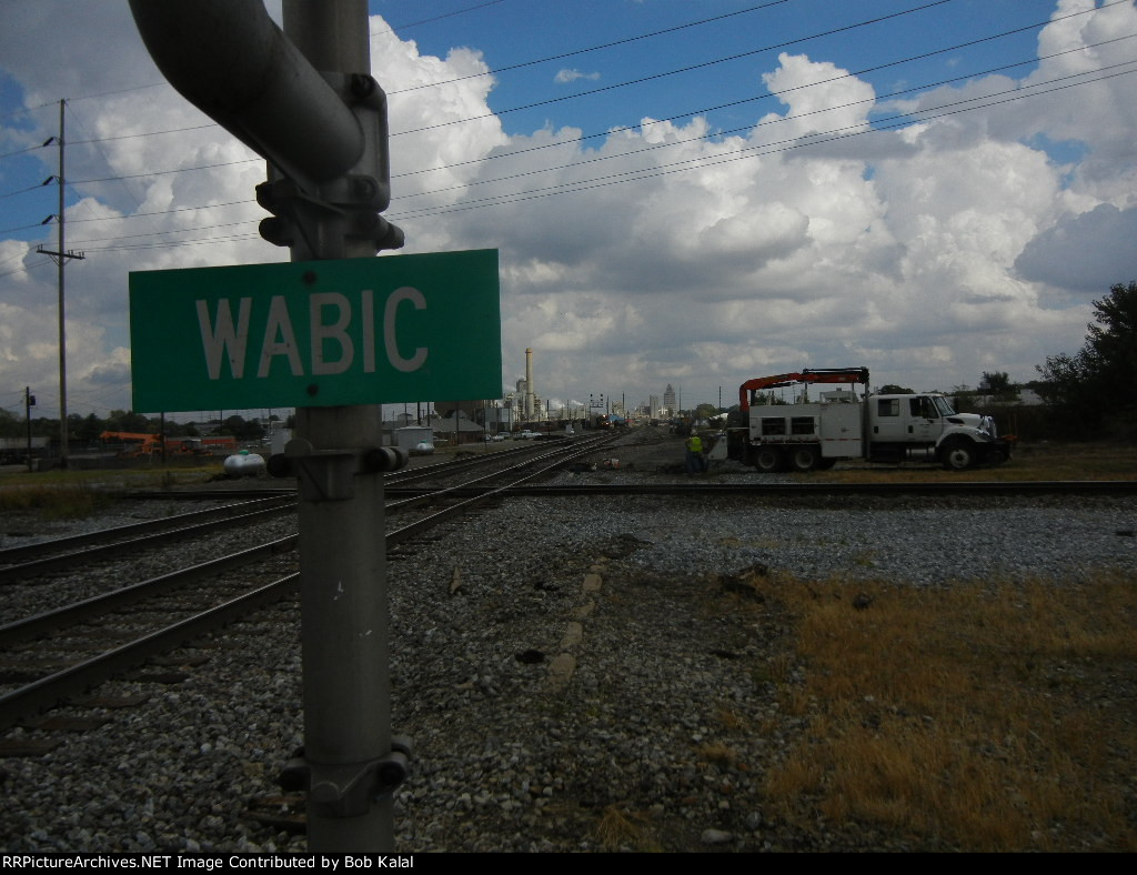 Westbound train proceeds out of yard