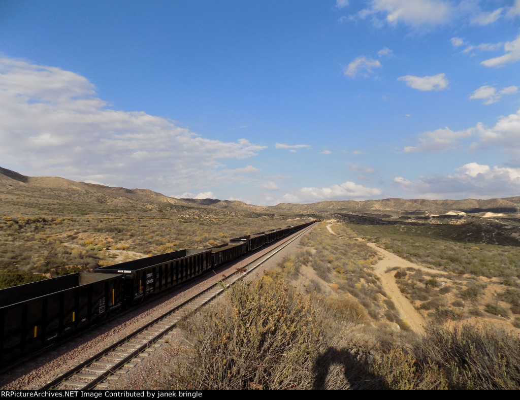 Contaminated soil train. Was making about 10mph uphill with 5 units