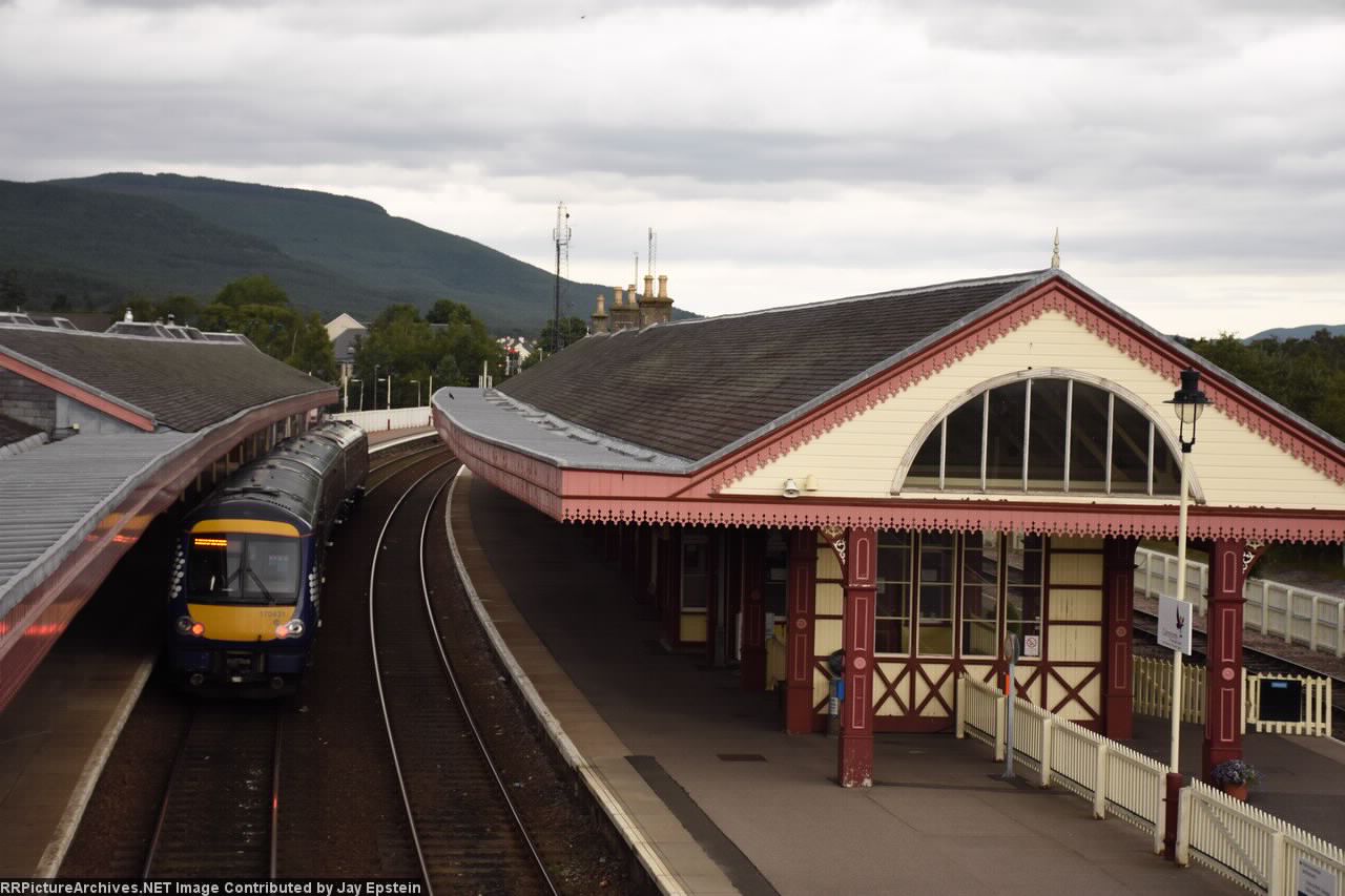 A Class 170 waits to depart