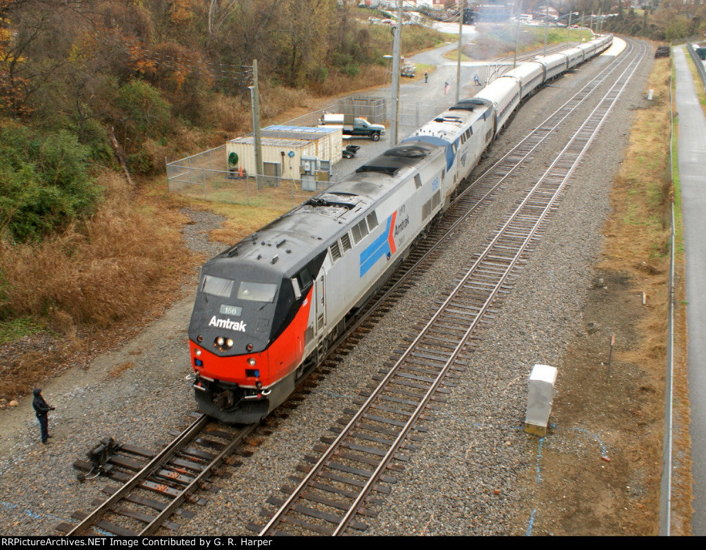 Train 156 with AMTK 156 on head end pulls out of the storage track and ...