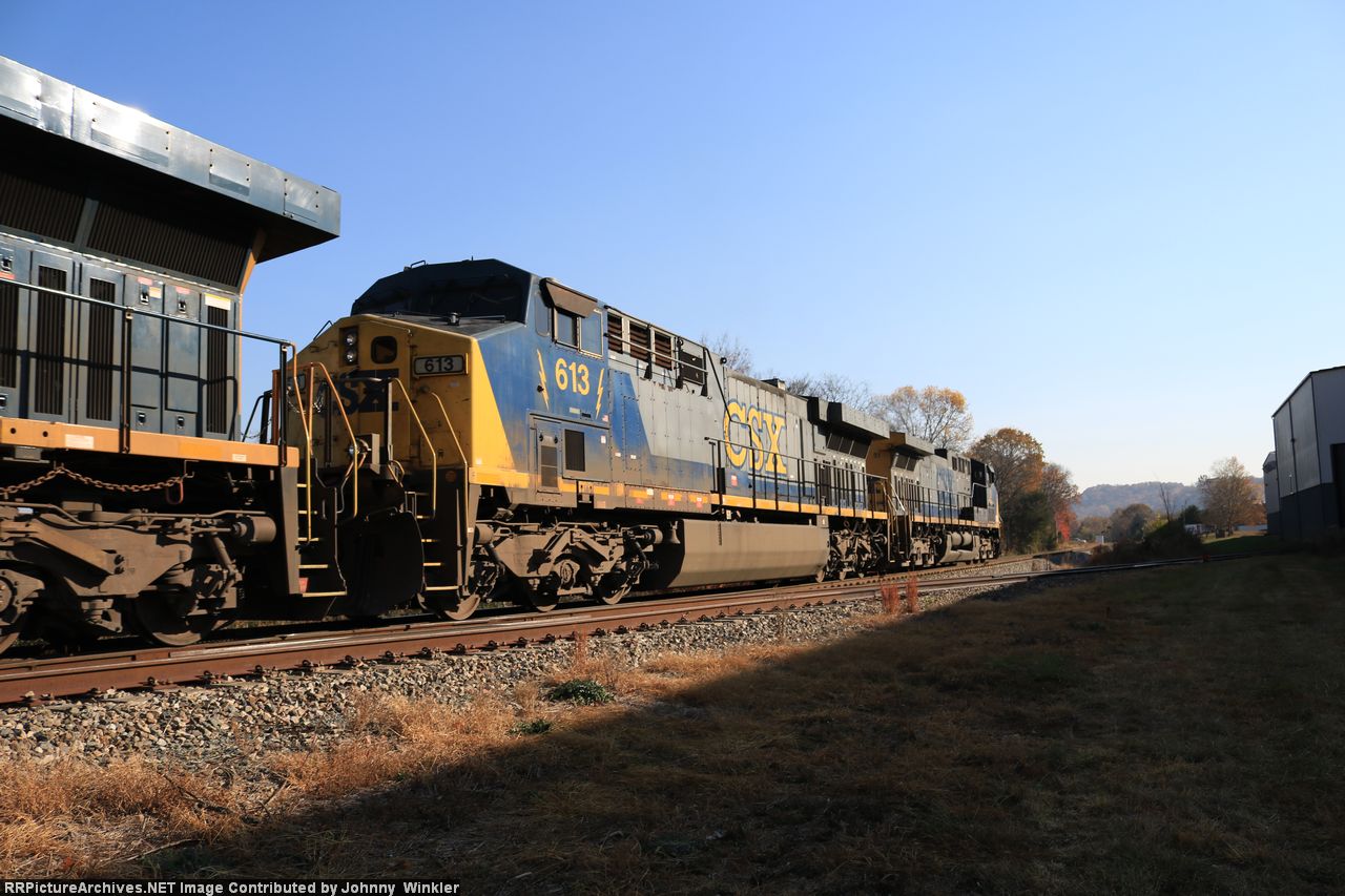 CSX 613 on coal train behind Gerdau Steel
