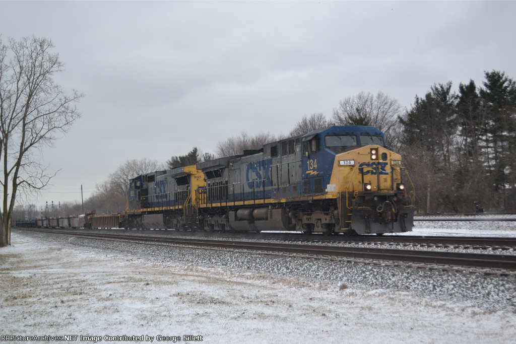 A pair of YN2 painted locos speed east.