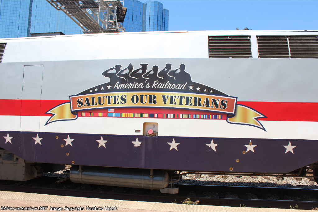 The "America's Railroad Salutes Our Veterans" logo