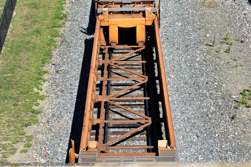 Empty deep well car.