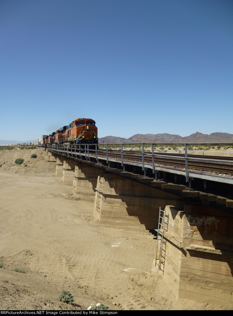 BNSF eastbound at large bridge east of Cadiz