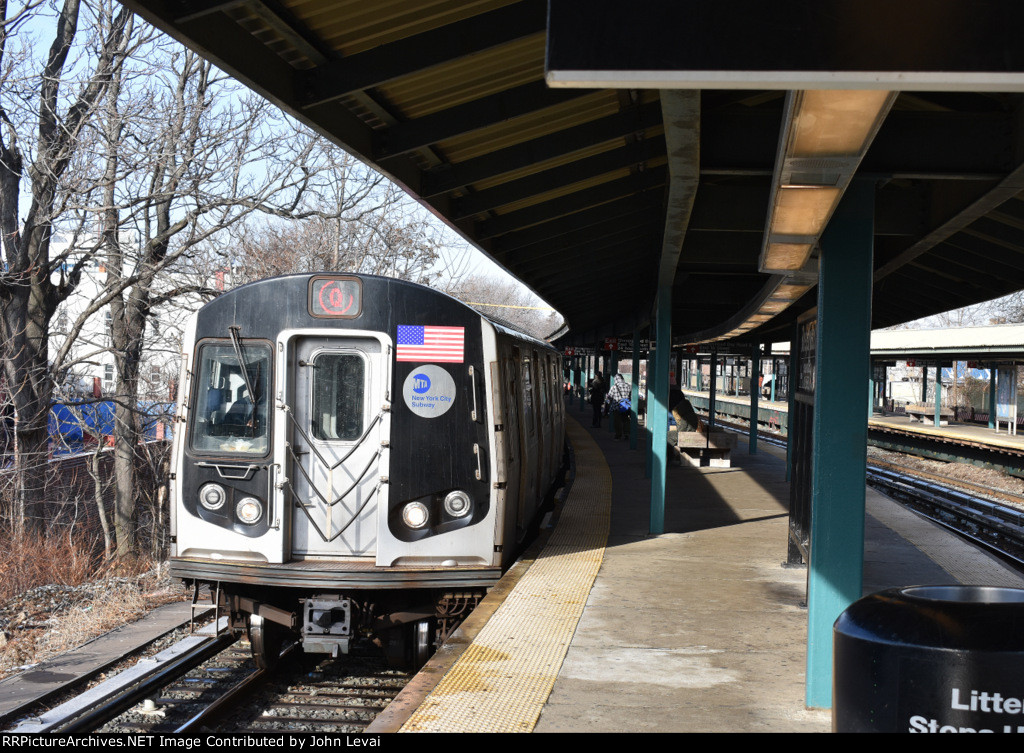Coney Island bound Q train arriving into Sheepshead Bay Station