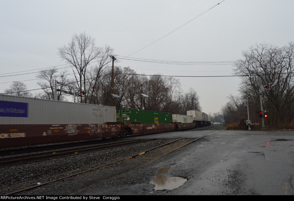 EMHU container in well car.