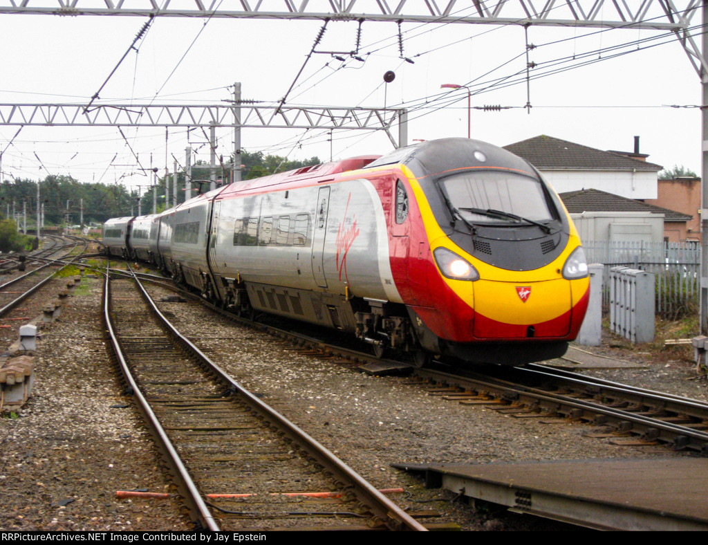 A Class 390 "Pendolino" arrives from London