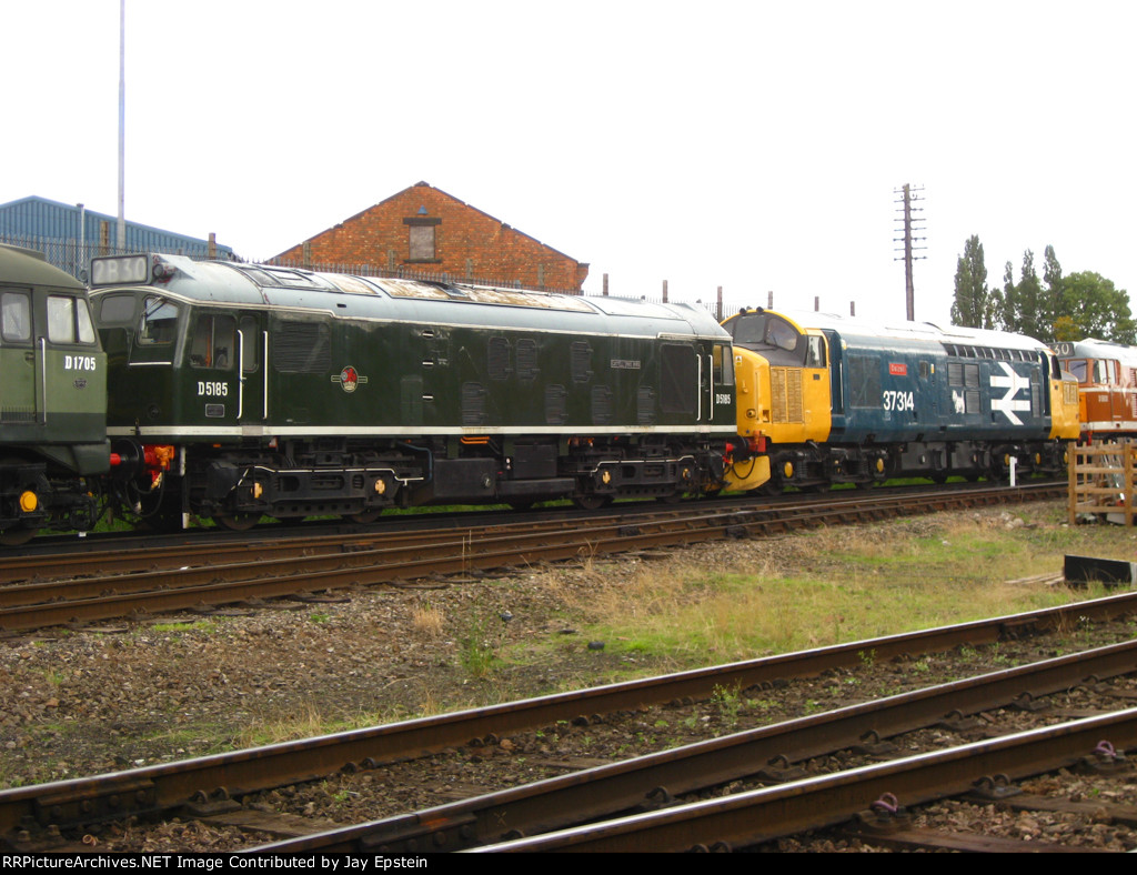A Class 25 and a Class 37 wait for their next assignment