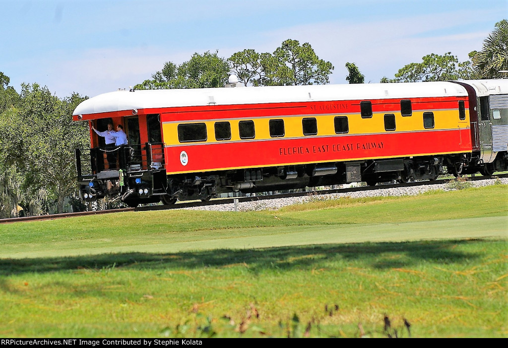 FEC ST AUG WITH OFFICAL ON THE REAR PLATFORM