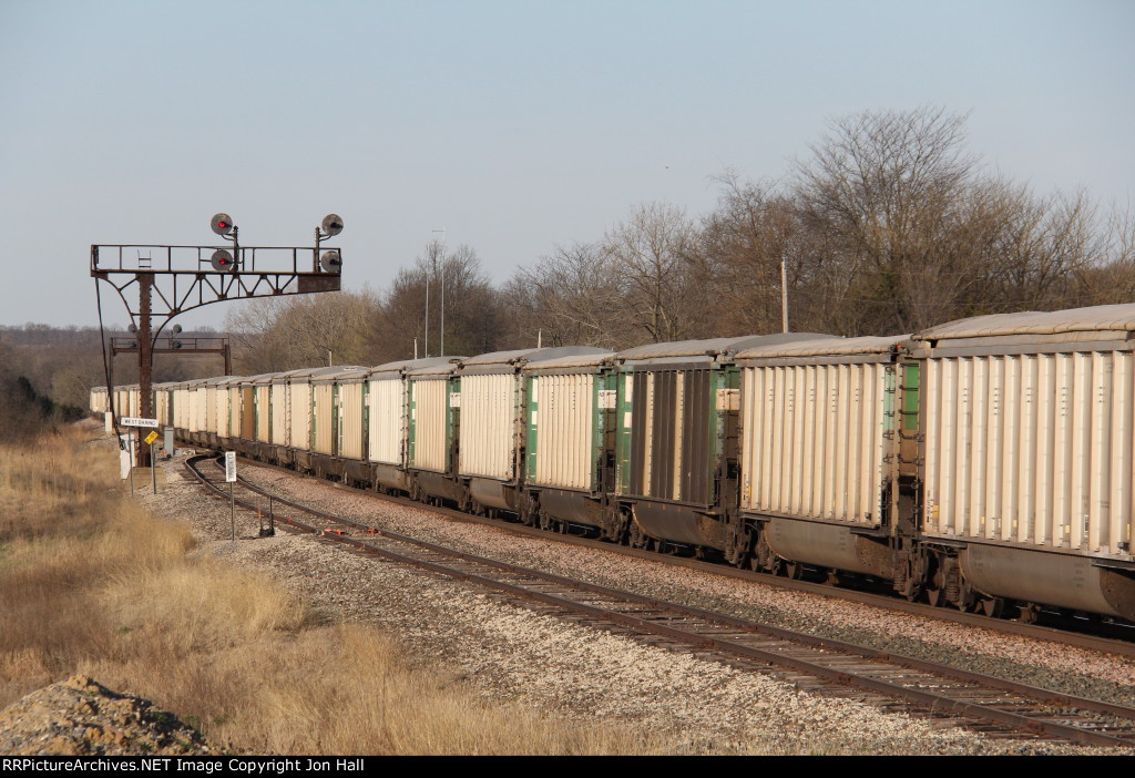 A unit train of bethgons rebuilt for protein service roll east
