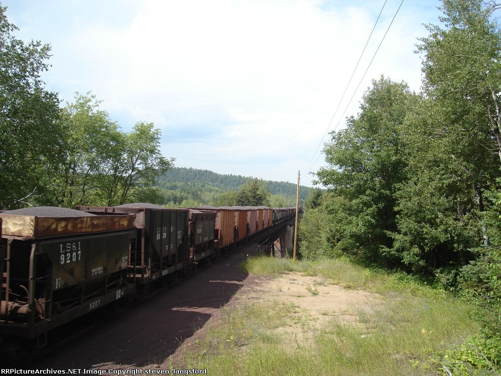 Loaded Ore Cars On The Bridge