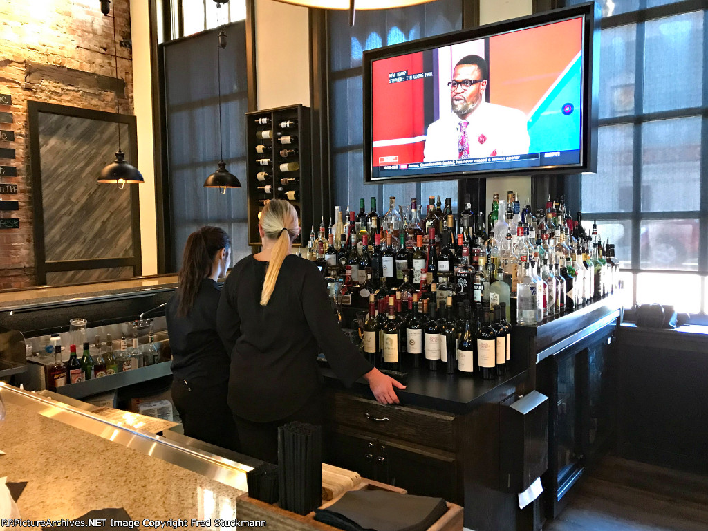 Our servers and a well stocked bar.