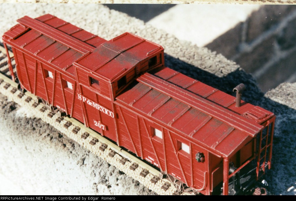 An aerial view of the same wooden caboose