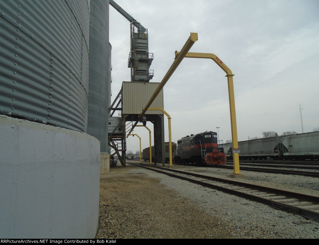 AGRAIL Engine #35 sitting at the Grain Elevator in the Yard