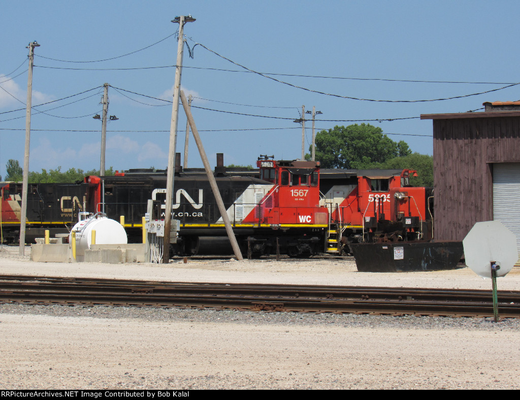 CN switcher 1567 sitting outside roundhouse