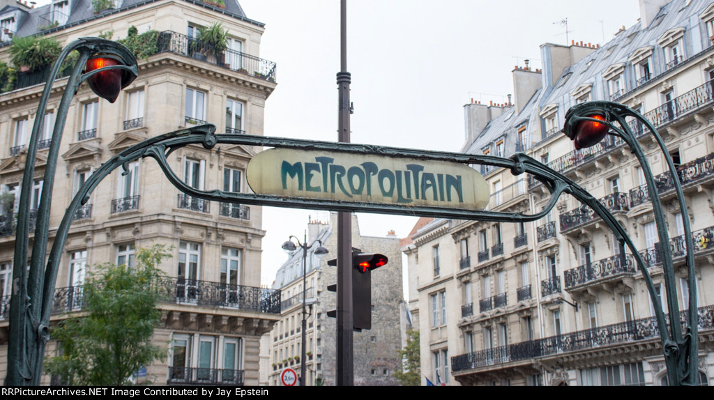 Close-up of a classic Paris Metro station sign