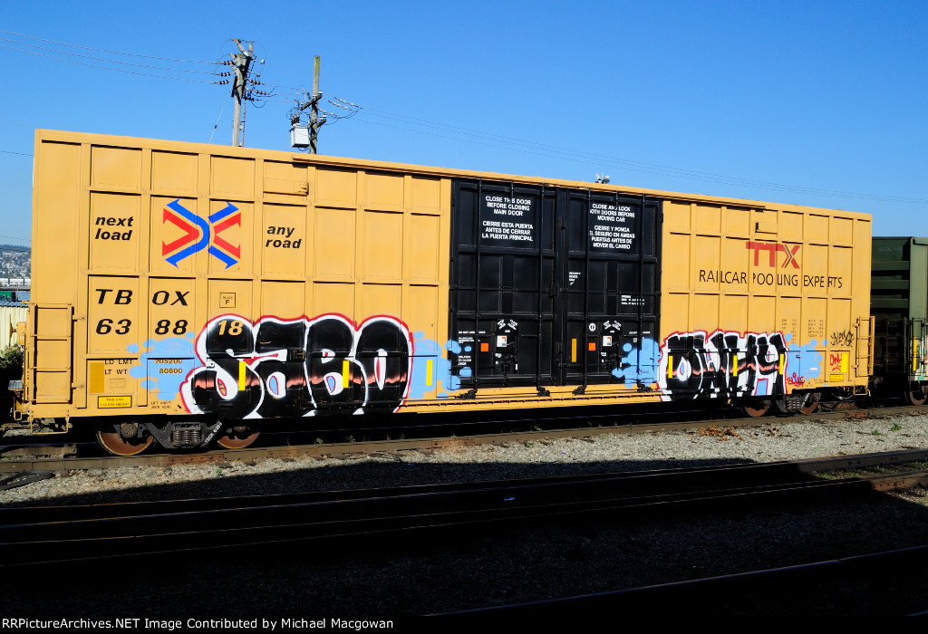 TBOX 638818 60-9 ft Double Door Excess Height Boxcar TTX (side A)