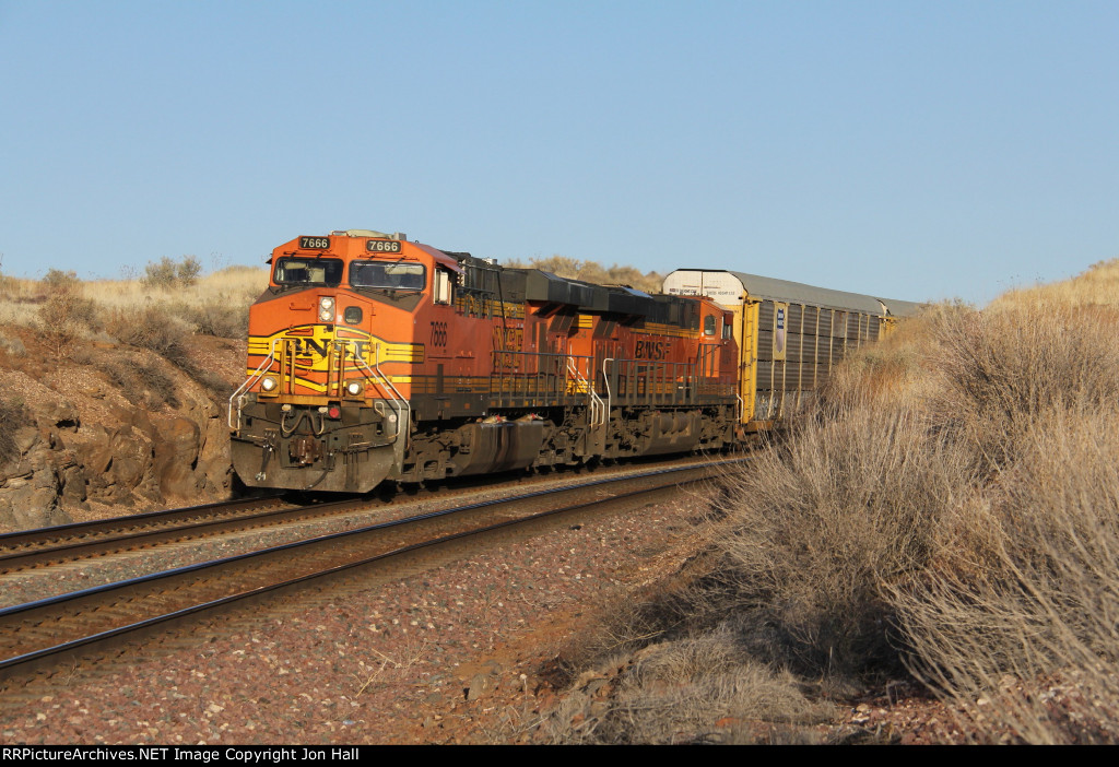After waiting for other traffic, BNSF 7666 comes west with V-BIRSBD3