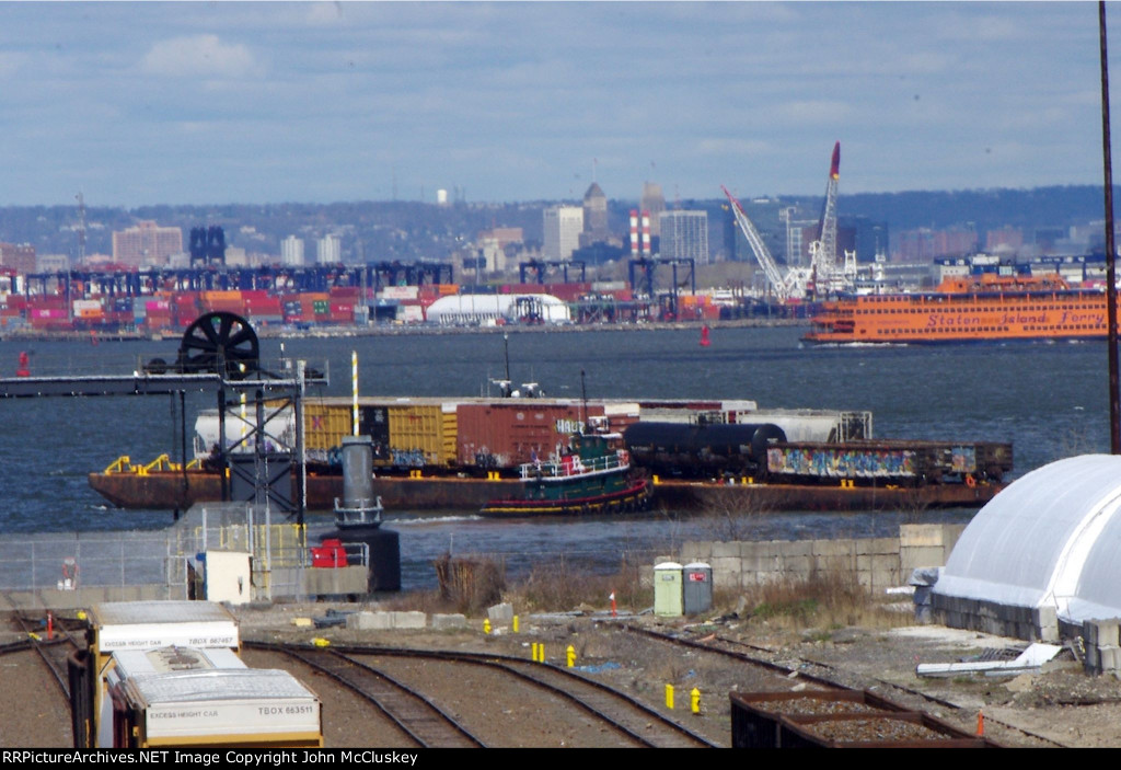 Tugs making the turn
