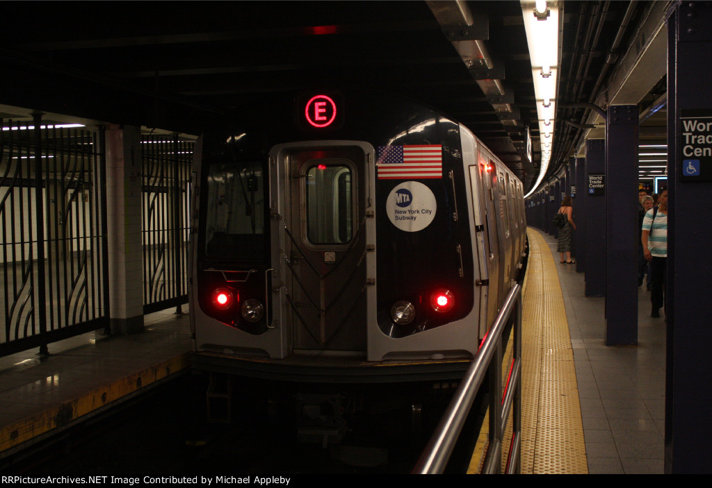 E train stopped at the end of track.