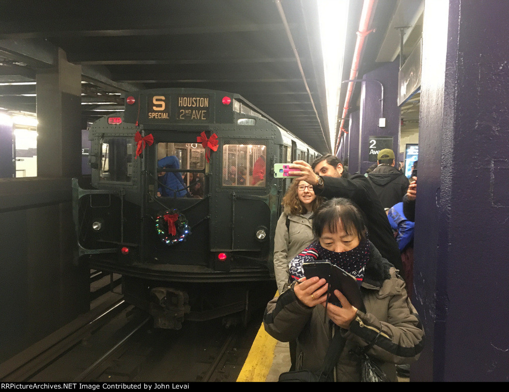 NYCMTA 2019 Vintage Holiday Subway at 2nd Ave Station with proud fans