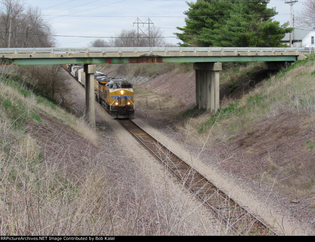 UP 2748 6964 Southbound towards Sidney under Cnty Rd 1000 Bridge