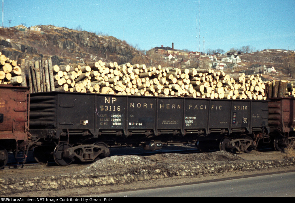 BN, ex-NP, gondola #53116 filled with pulp wood
