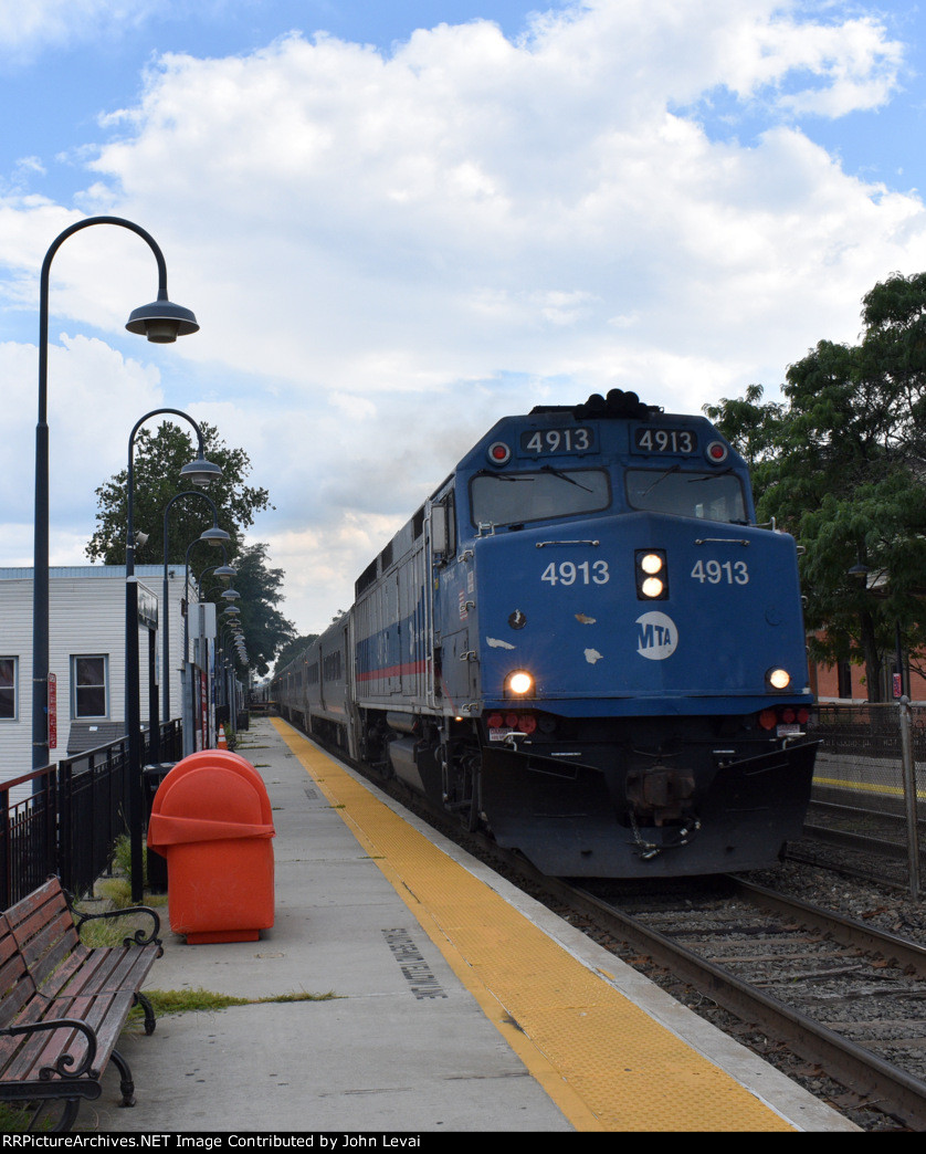 NJT Train # 77 passing Rutherford Station with MNR F40PH-3C leading