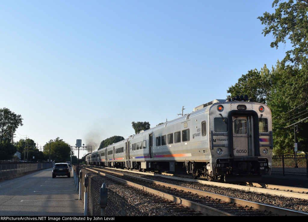 NJT Comet V Cab trailing out of Rutherford Station on 1879
