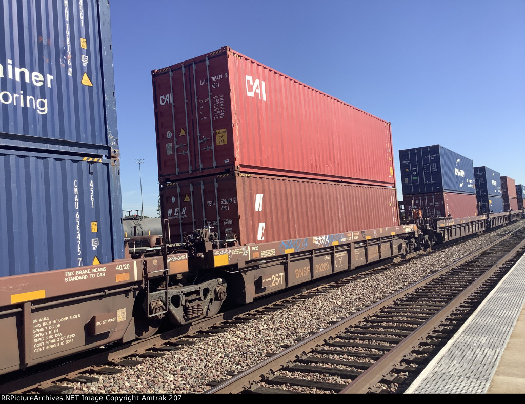 A CAI Container and an UES Container Sit at Commerce