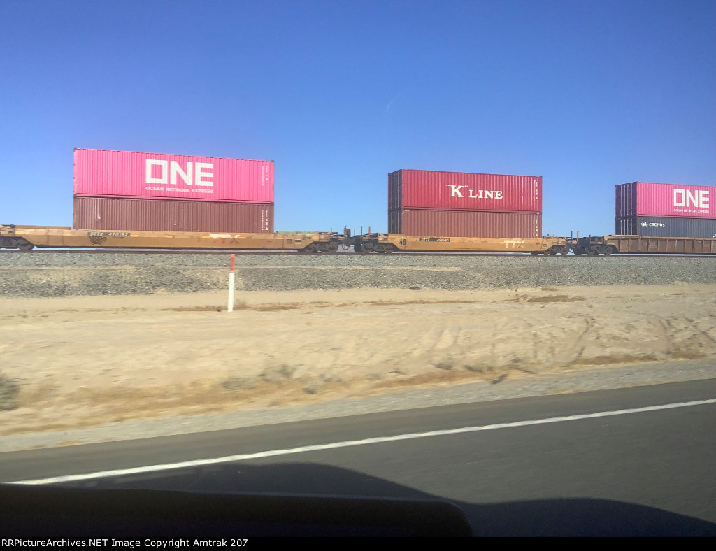 Two Elder TTX Single Well Cars Sit at Bombay Beach