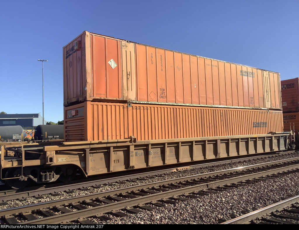 Two Types of Schneider National Containers Rest at Commerce