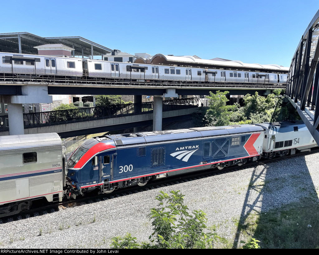 Front side view of ALC-42 # 300 in the consist of Amtrak Train # 30