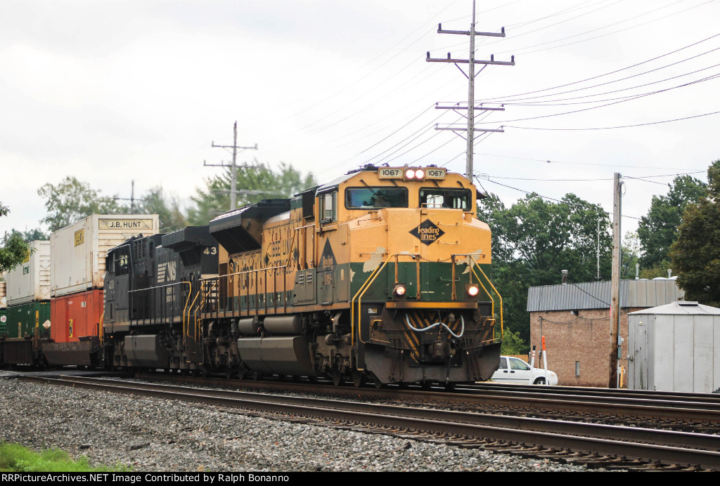 Westbound NS intermodal through town with the Reading heritage unit on ...