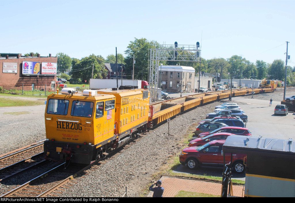 This odd looking thing is a Herzog Rail Services MoW train rolling ...